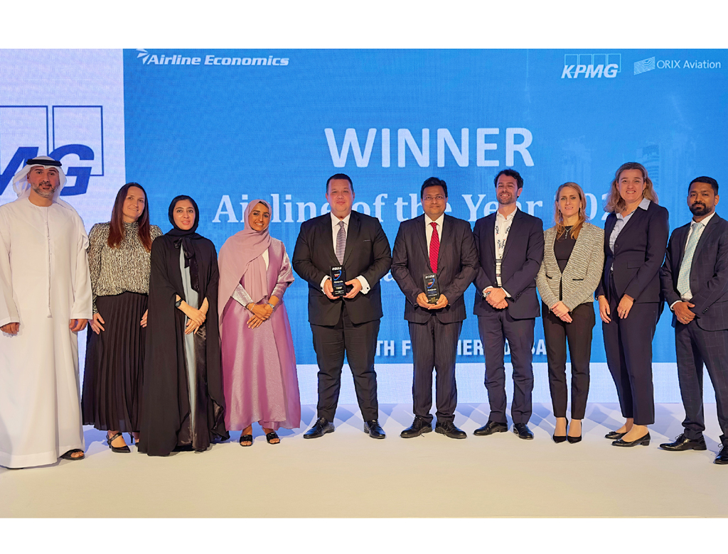 Adam Boukadida (fifth from left) and members of the finance team