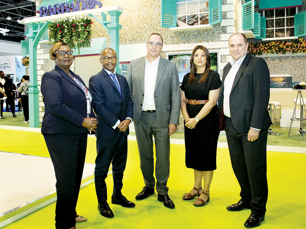 Visit Barbados and dnata representatives at the Barbados stand at ATM ...